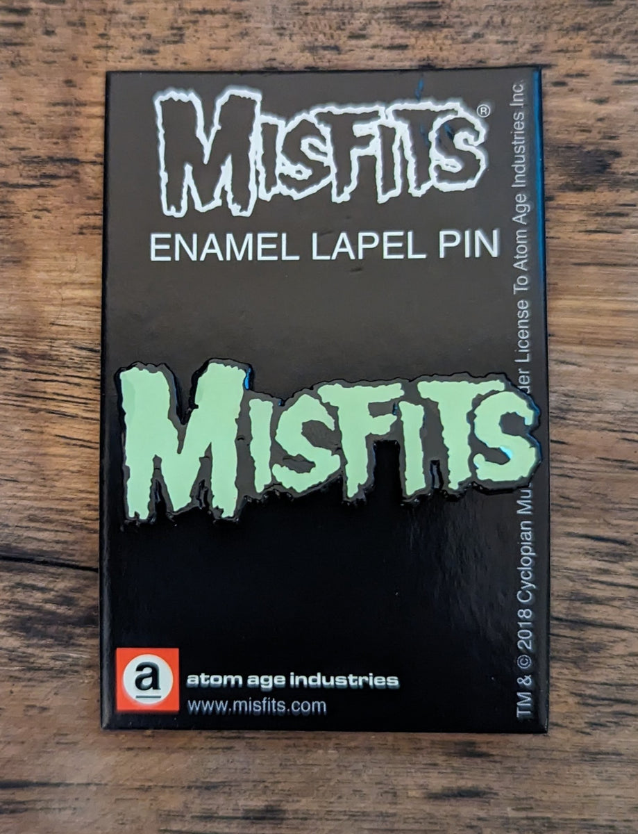 THE MISFITS WORD LOGO GLOW IN THE DARK ENAMEL PIN – Atomic Art and Music